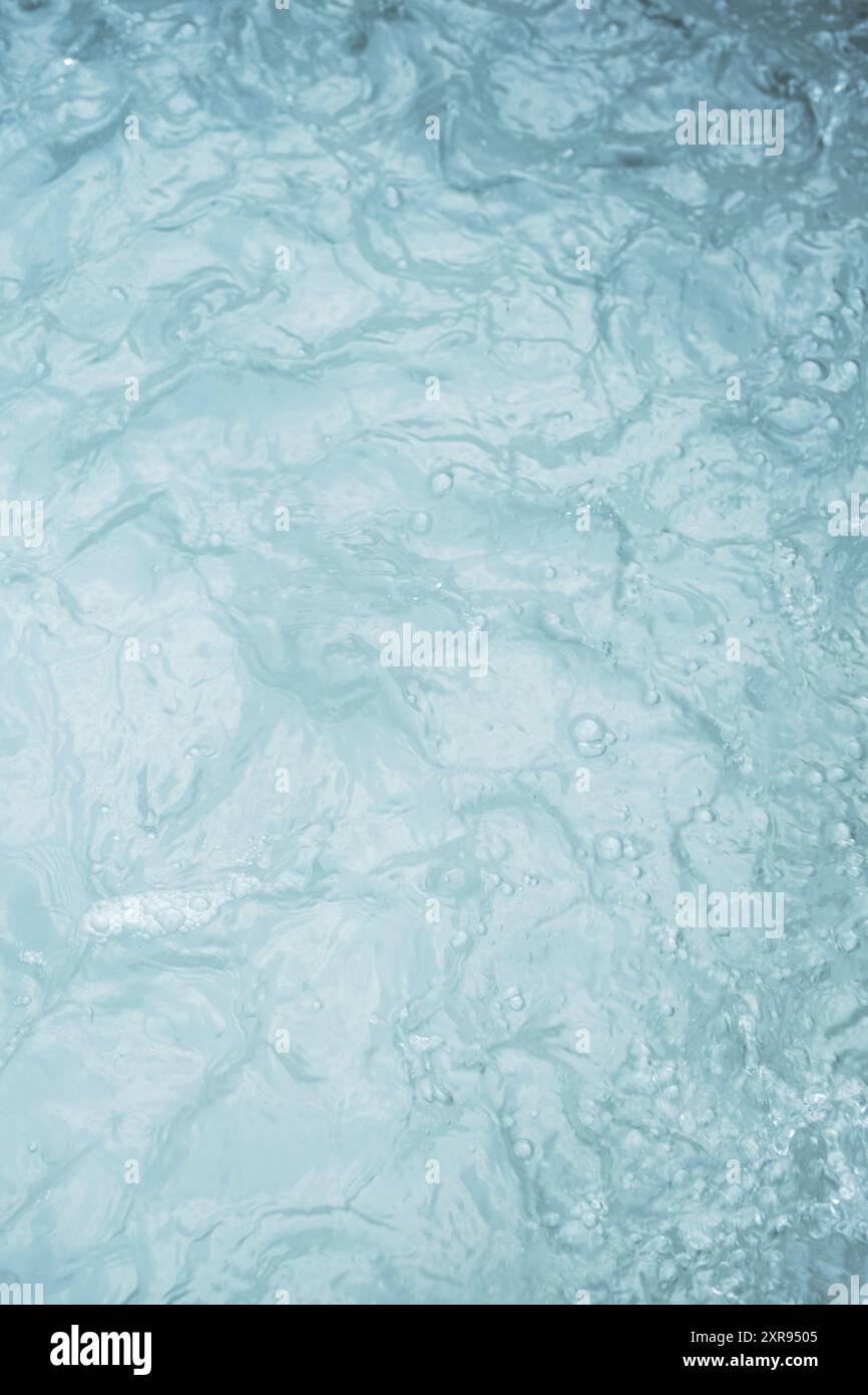 Turbulent water surface with visible foam and ripples Stock Photo - Alamy