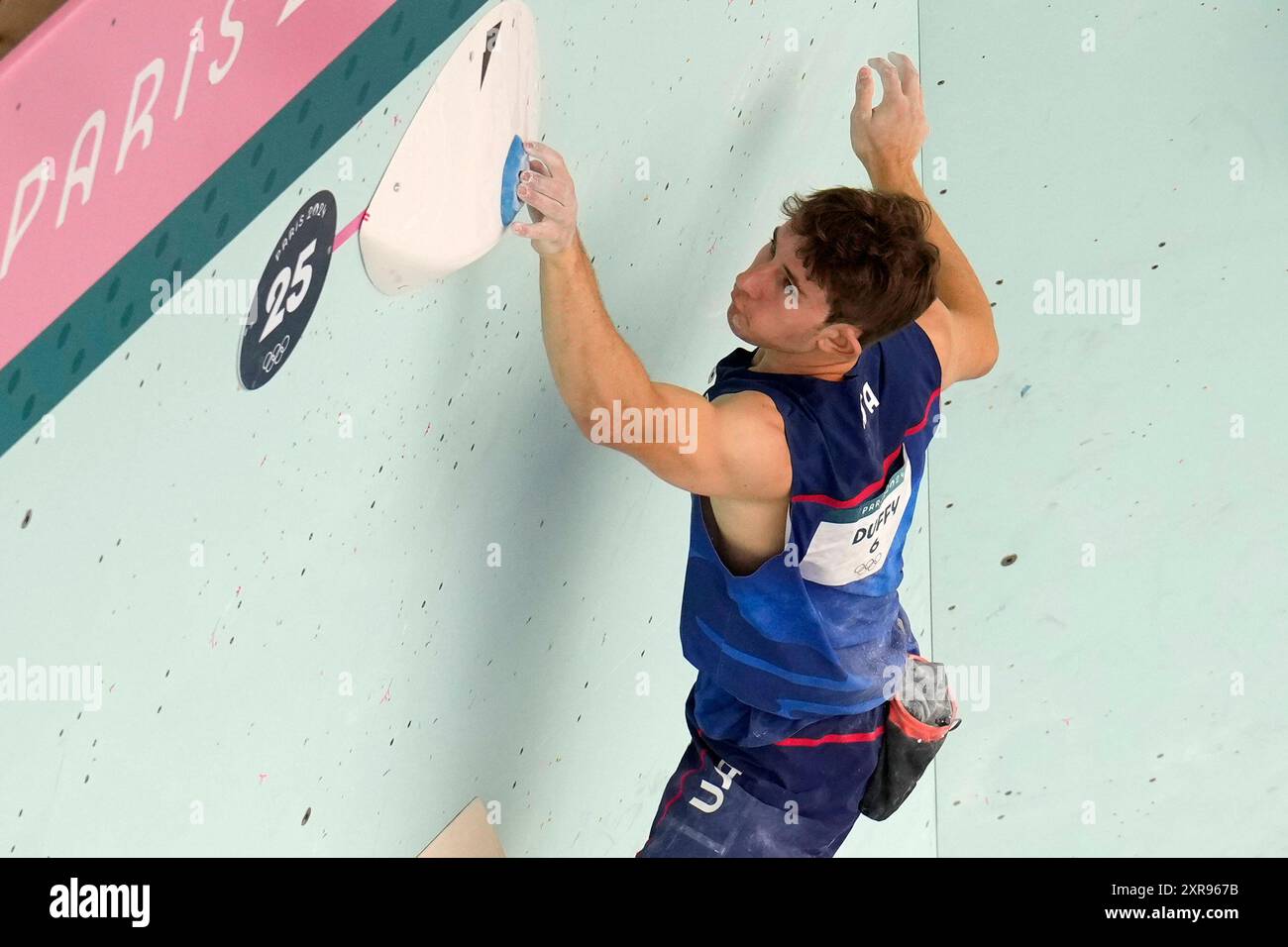 Colin Duffy of the United States competes in the men's boulder and lead ...
