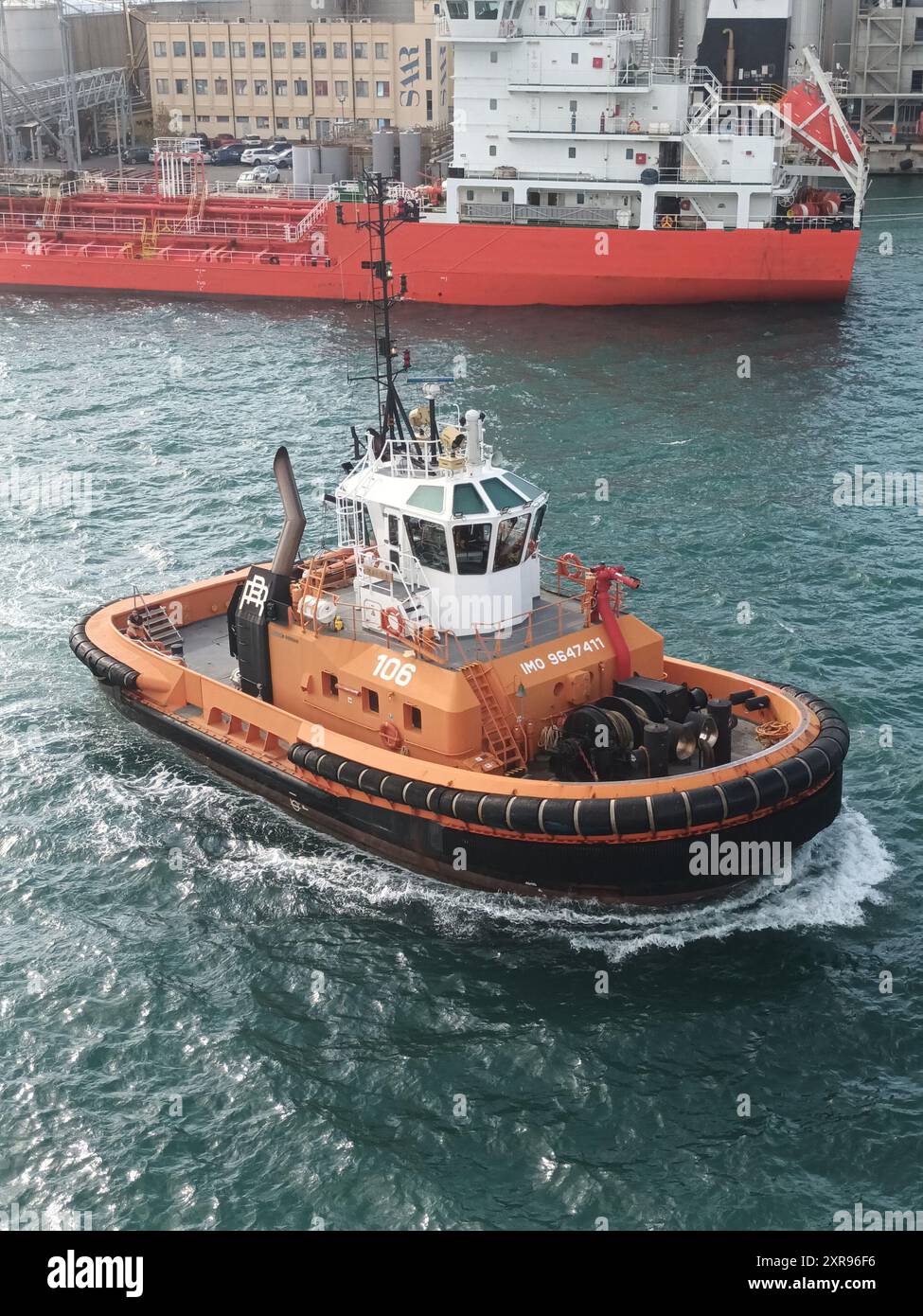 Tug boat port Stock Photo - Alamy