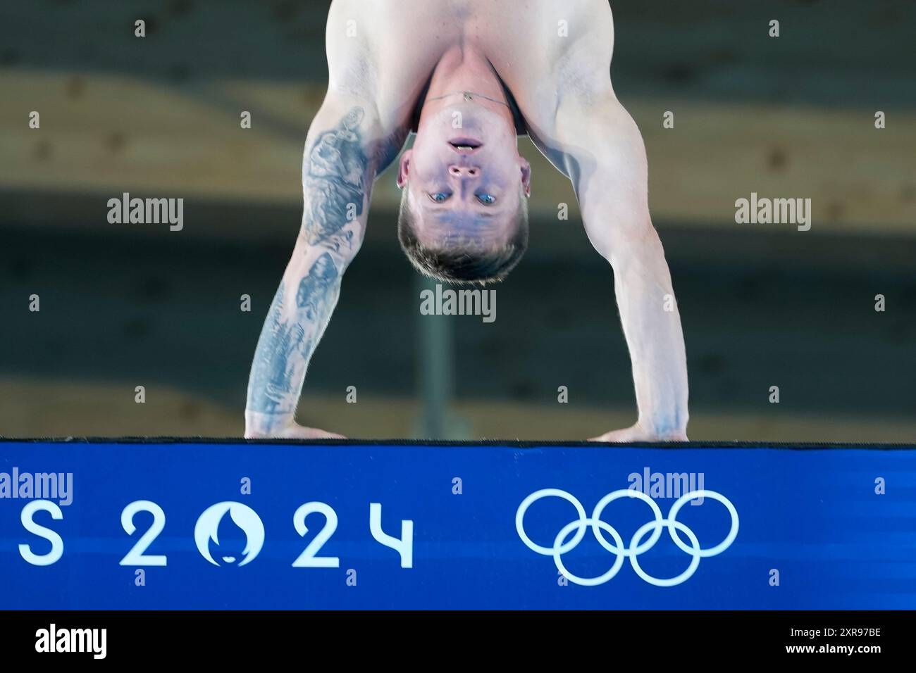 Uzbekistan's Igor Myalin competes in the men's 10m platform diving ...