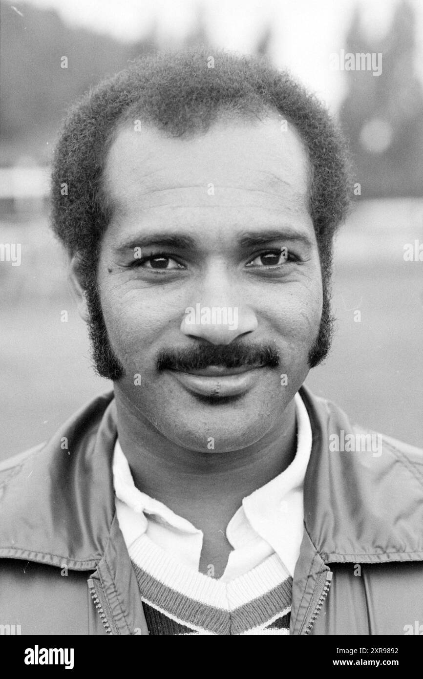 Portrait of a sportsman with frizzy hair and mustache, approximately 40 ...