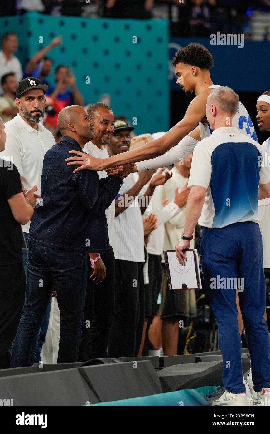 Victor Wembanyama of Team France and Tony Parker celebrate after France ...