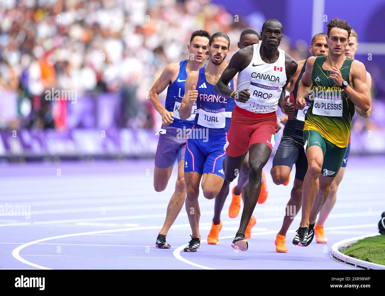 Paris, France. 9th Aug, 2024. Marco Arop (L front) of Canada competes ...