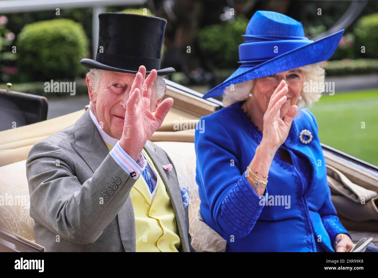 King Charles III and Queen Camilla wave from the Royal Procession ...