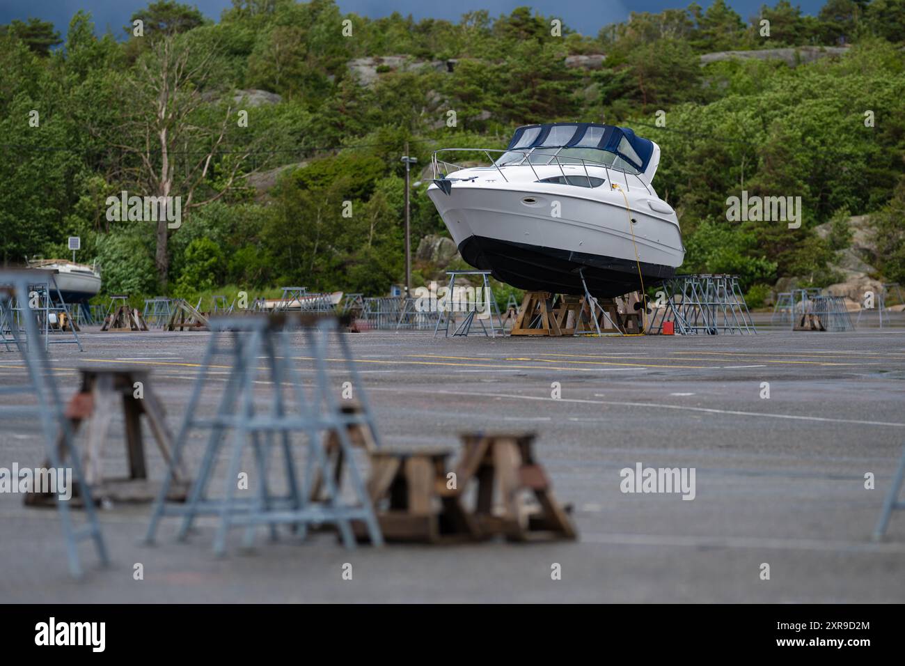 Lonely laid up boat at a marina lay up site Stock Photo - Alamy