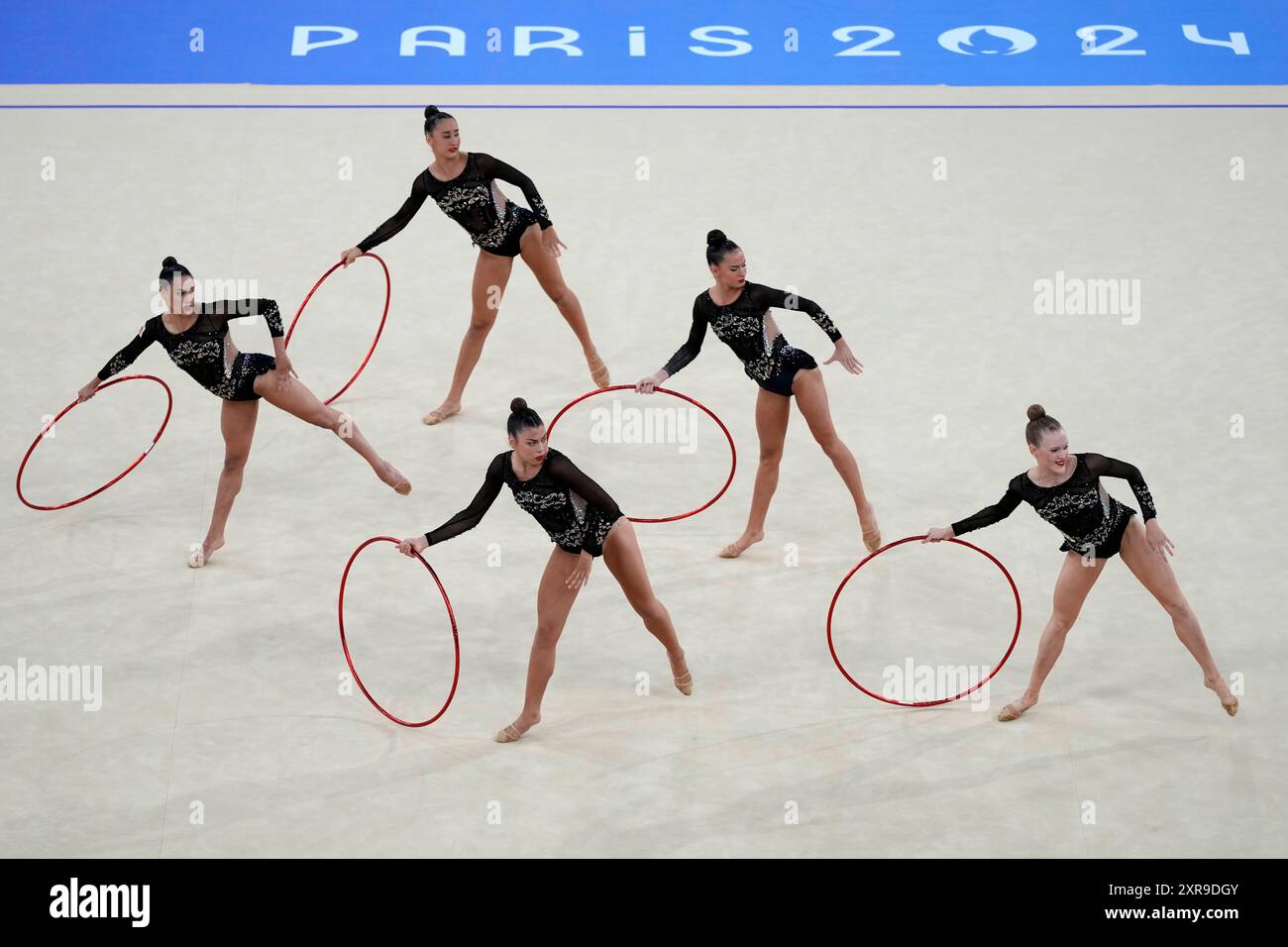 The team from Spain performs their hoop exercise in the rhythmic ...