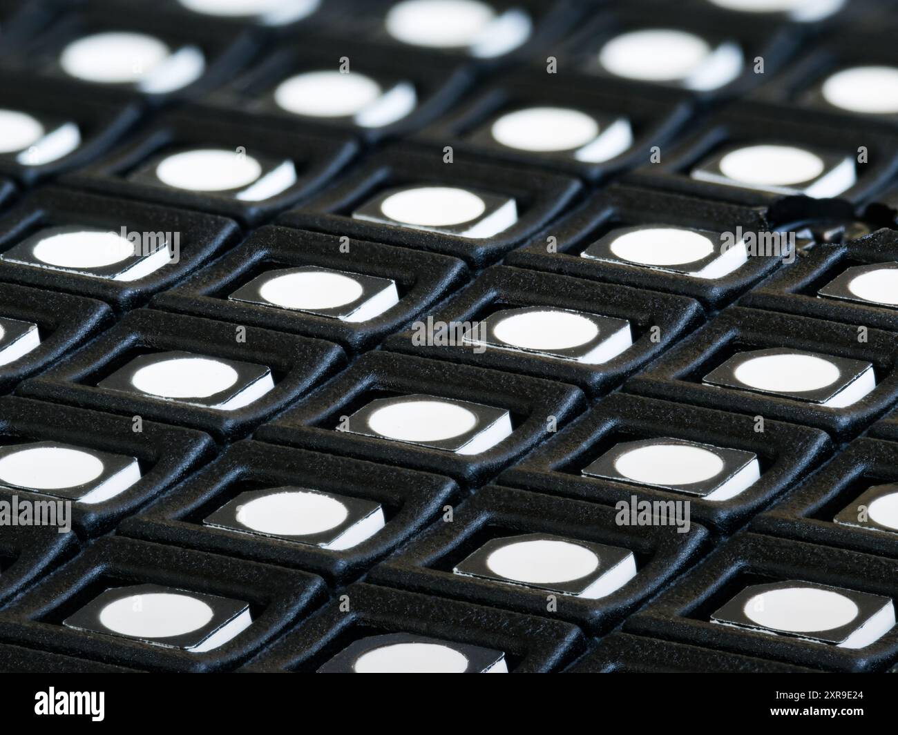 Diagonal macro shot of the surface of the LED screen module. Rows of ...