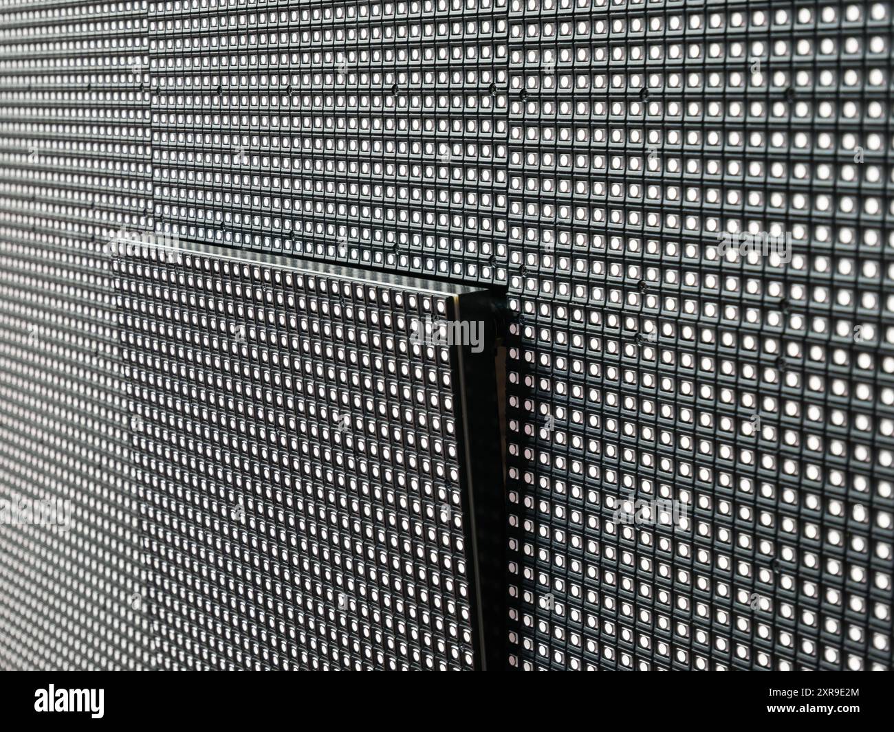 A close-up view of a single square LED module that has not taken its ...