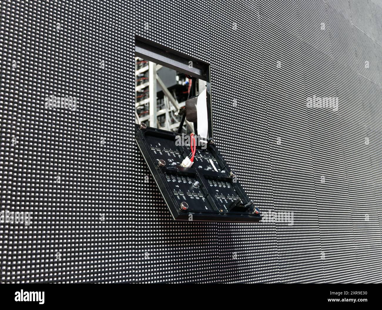 The LED module has fallen out of its place on the surface of the large ...