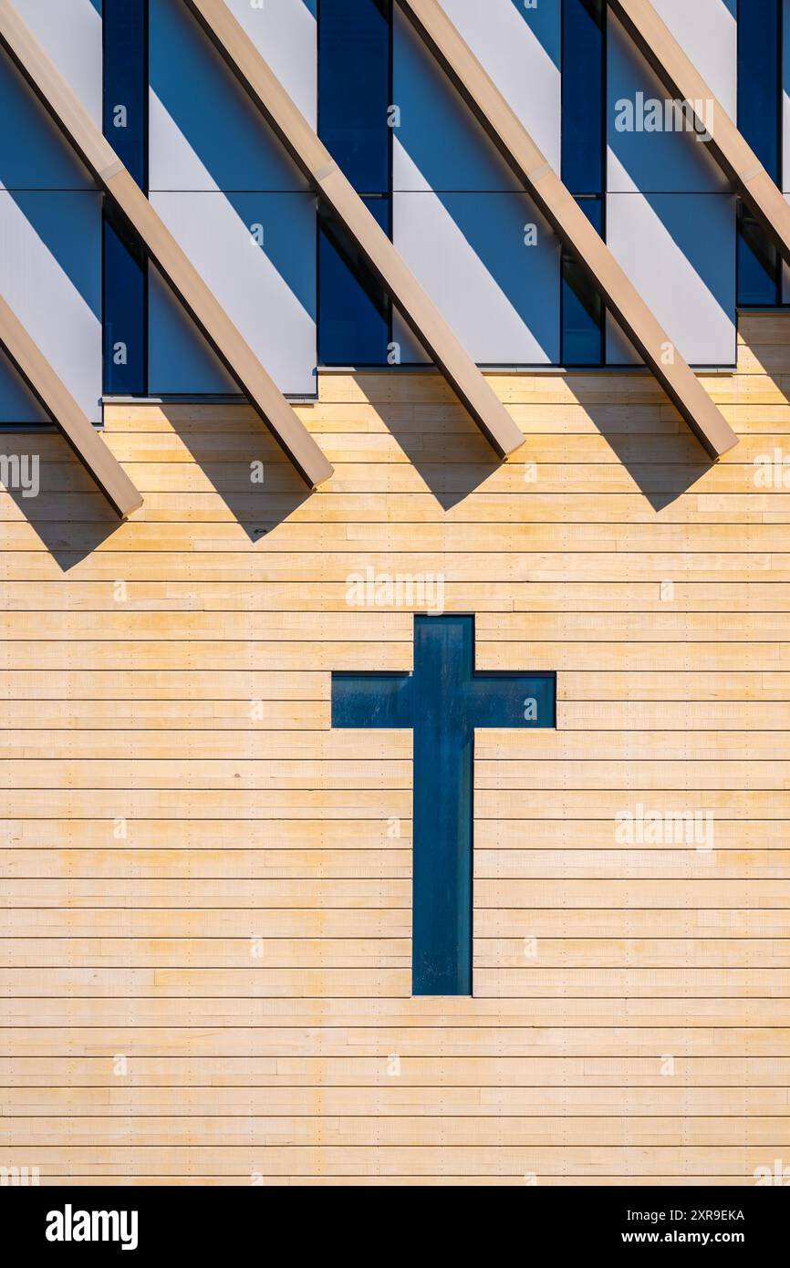 Cross on the facade of a church Stock Photo - Alamy