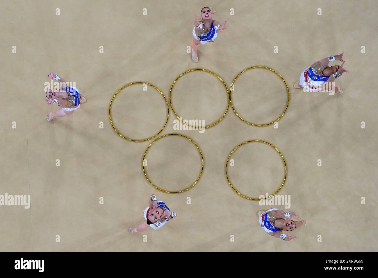 France's team perform their hoop exercise in the rhythmic gymnastics ...
