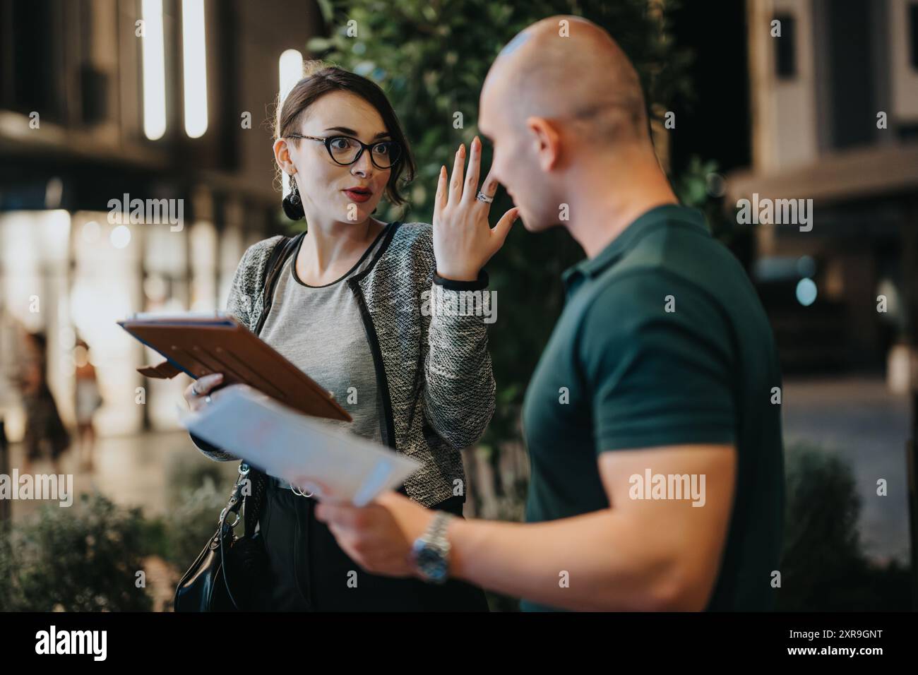 Business people having animated discussion hi-res stock photography and ...
