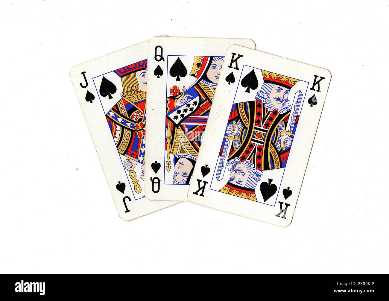 Vintage playing cards showing a run of jack, queen and king of spades ...
