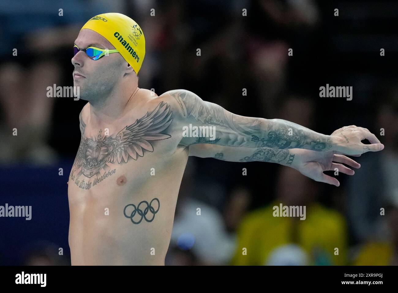 Kyle Chalmers, of Australia, competes during a heat in the men's 100 ...