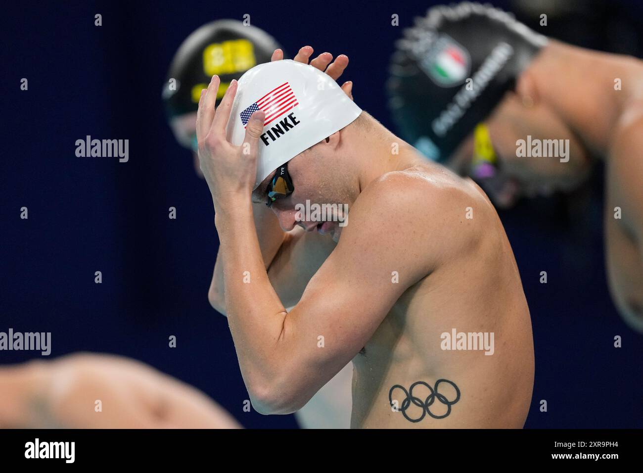 Bobby Finke, of the United States, prepares to start in his heat of the ...
