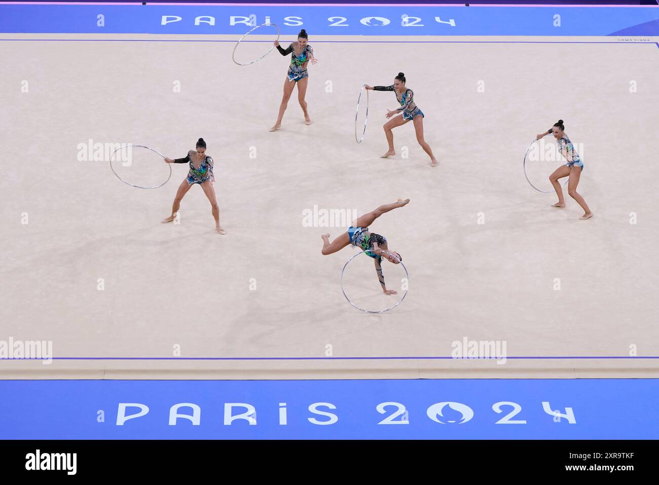 Italy's team performs their hoop exercise in the rhythmic gymnastics ...