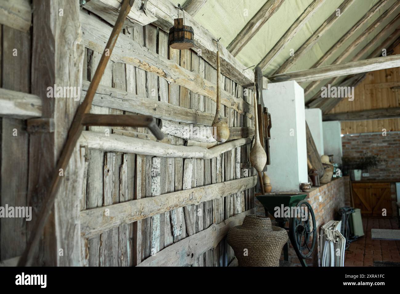 Antique scythe hanging on the wall in the barn.Old farm tools. High quality photo Stock Photo ...