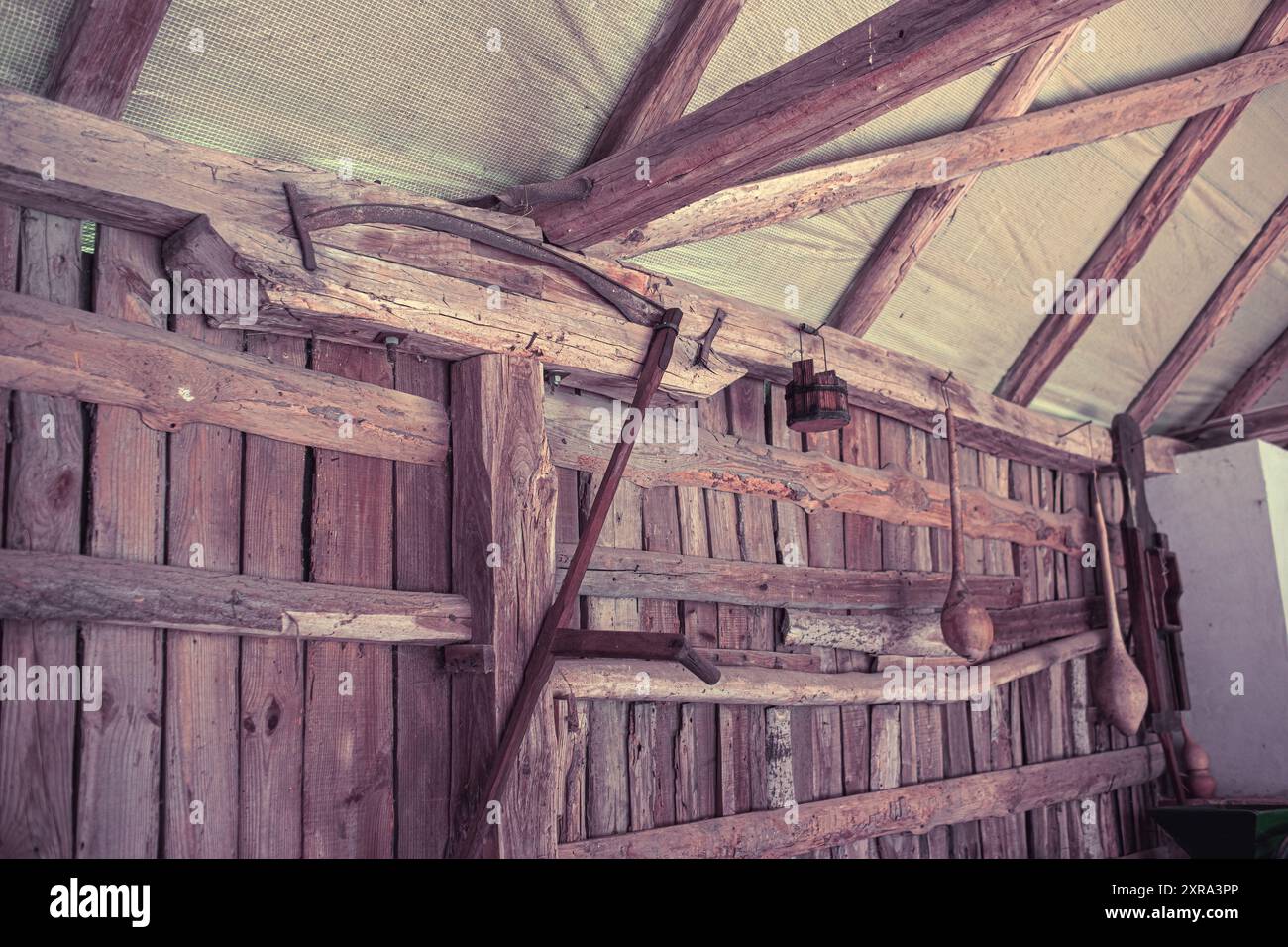 Antique scythe hanging on the wall in the barn.Old farm tools. High quality photo Stock Photo ...