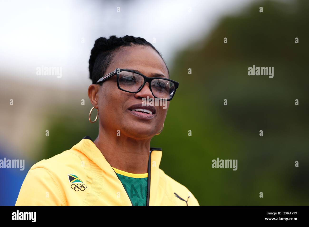 Beverly McDonald is presented with her reallocated Olympic bronze medal ...