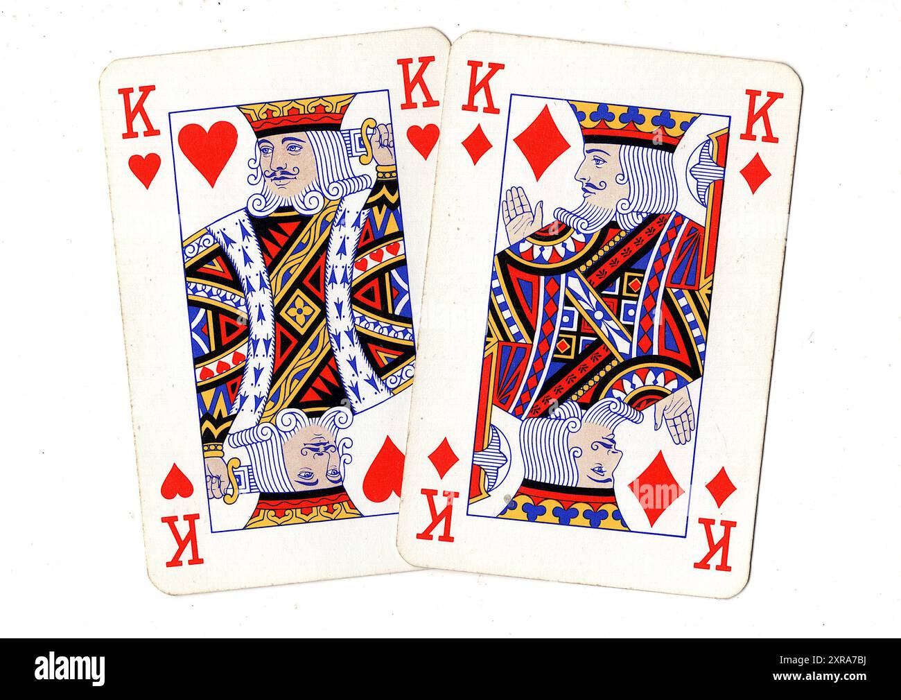 Vintage playing cards showing a pair of kings on a white background ...