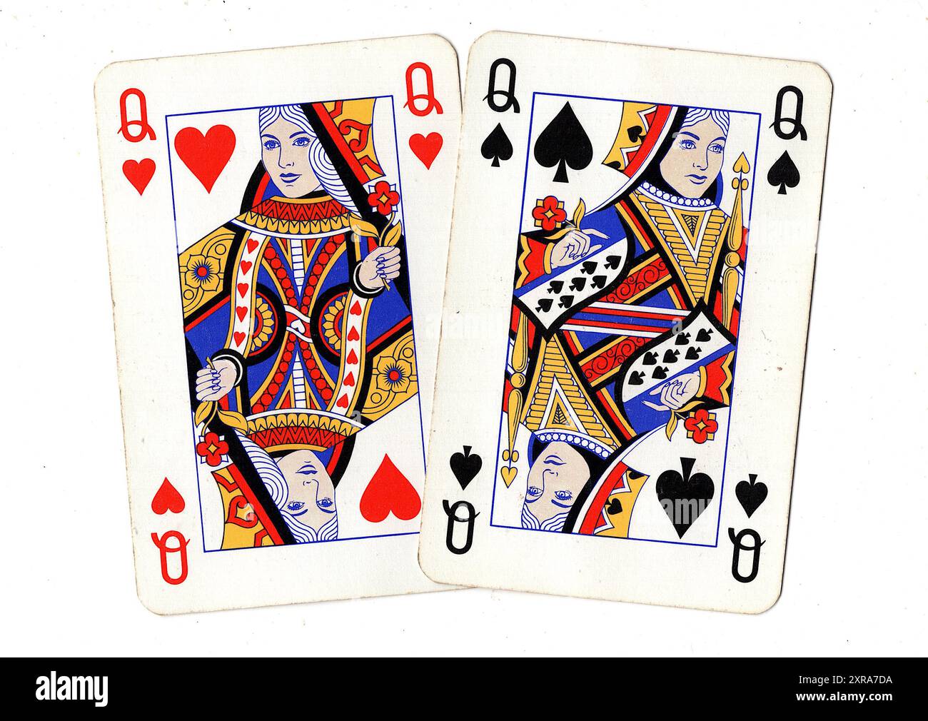 Vintage playing cards showing a pair of queens on a white background ...