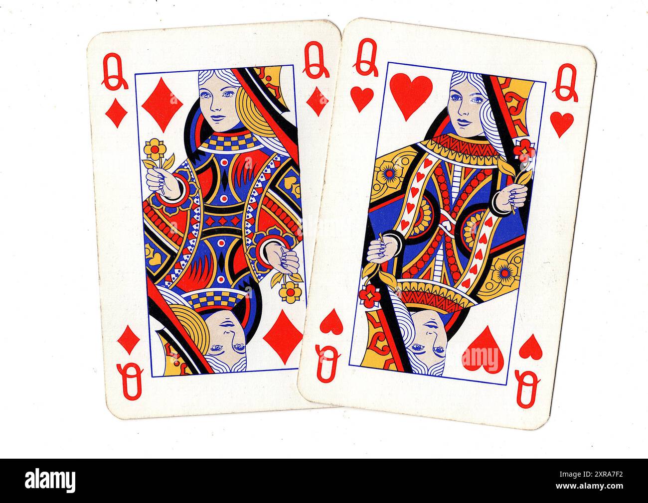 Vintage playing cards showing a pair of queens on a white background ...