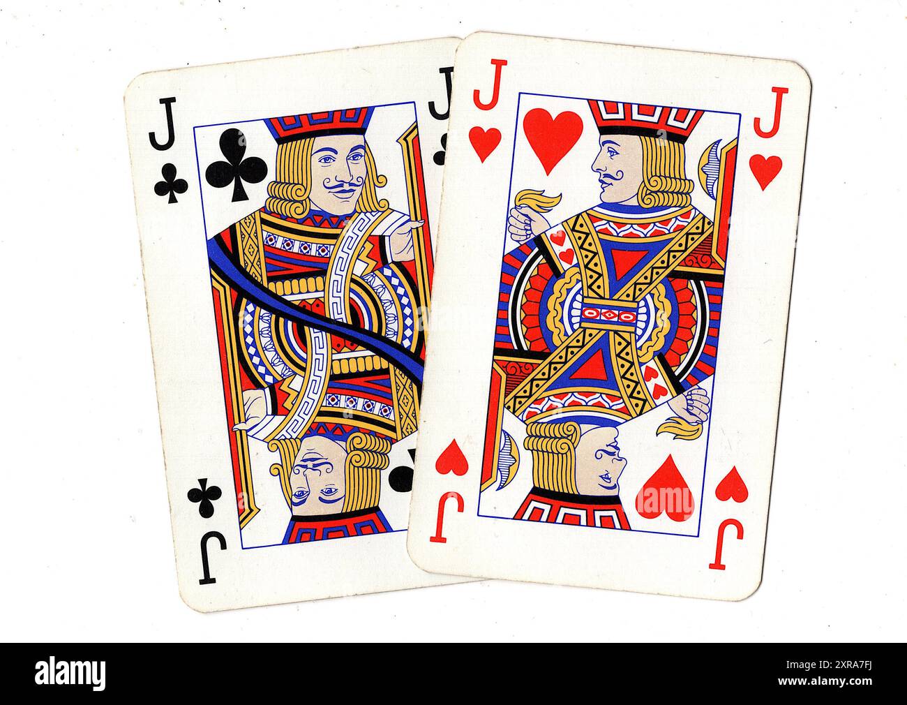 Vintage playing cards showing a pair of jacks on a white background ...