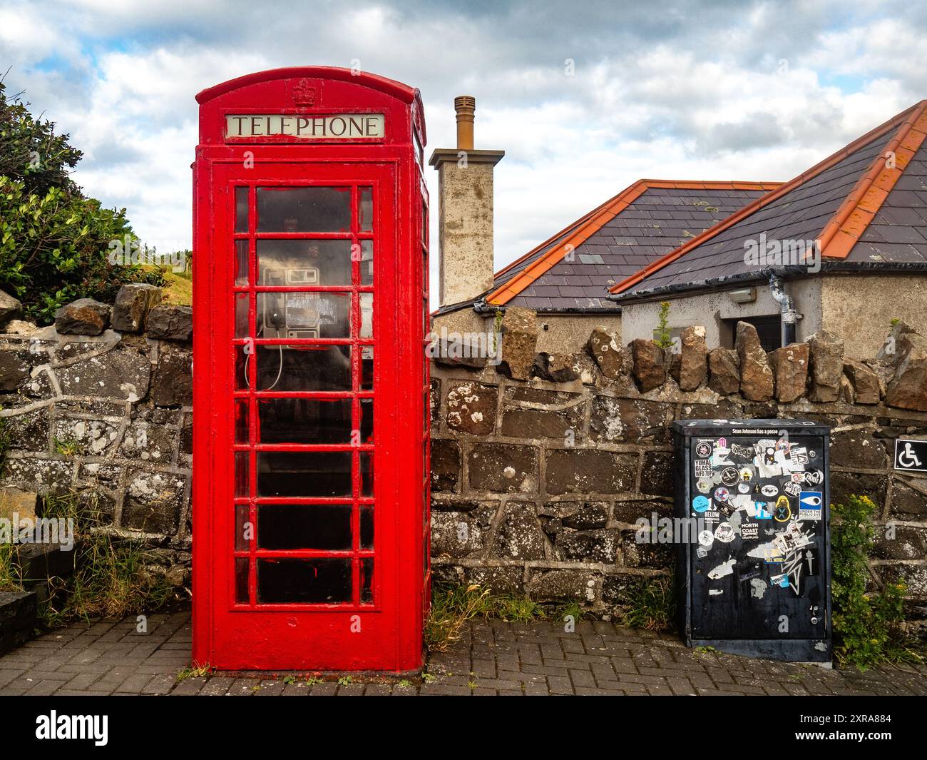A famous red phone box at the volcanic formation. The Giant’s Causeway ...