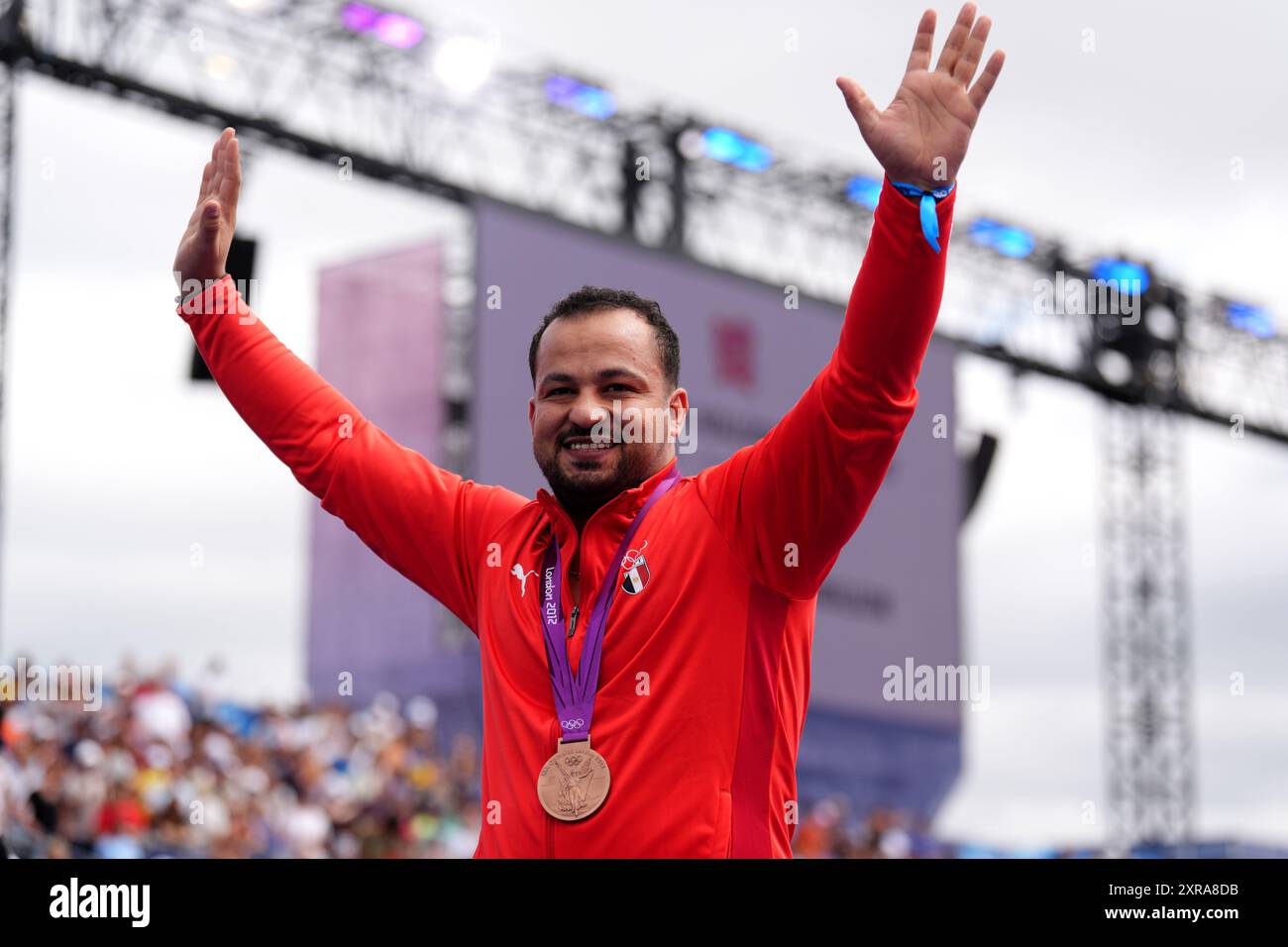 Tarek Yehia Fouad Abdelazim is presented with his reallocated Olympic Bronze medal from the ...