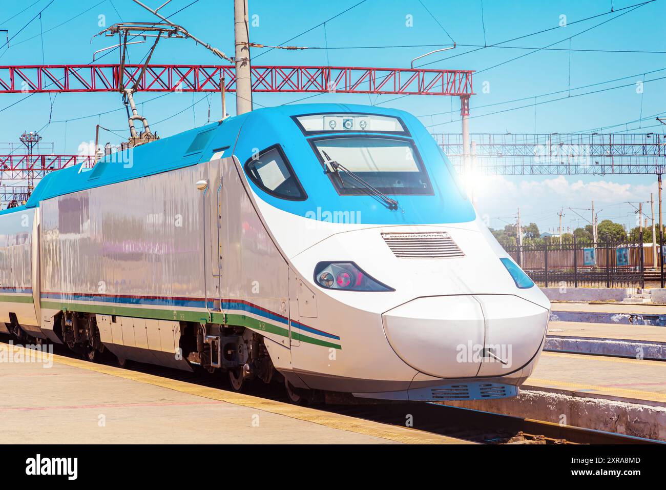 High-speed passenger express "Afrosiyob" at the platform of Bukhara ...