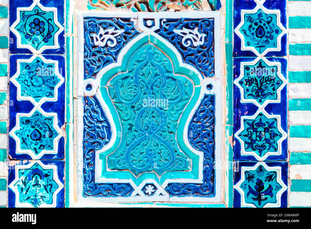 Traditional Uzbek pattern on ceramic tile. Fragment of the decor of the ...