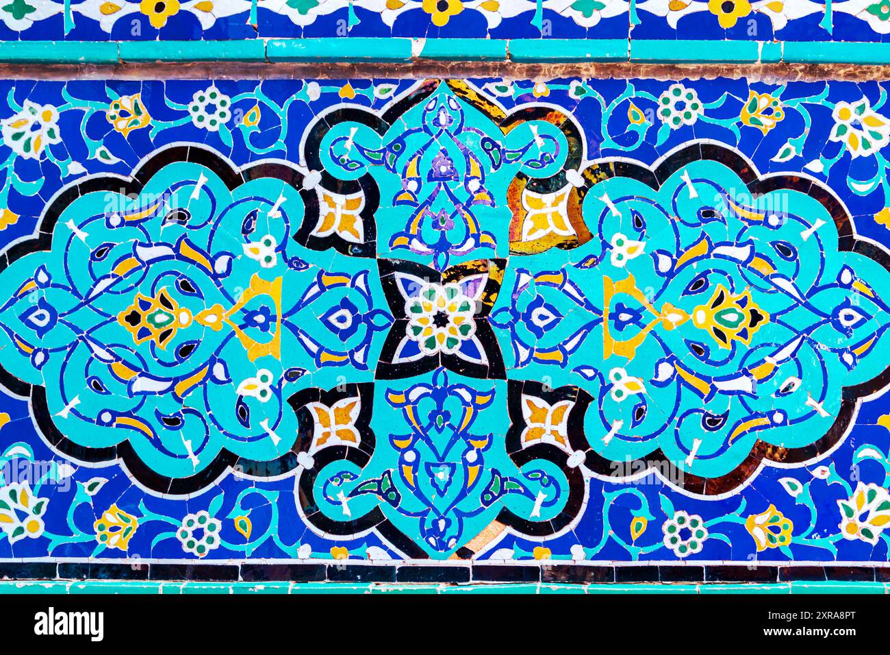 Traditional Uzbek pattern on ceramic tile. Fragment of the decor of the ...