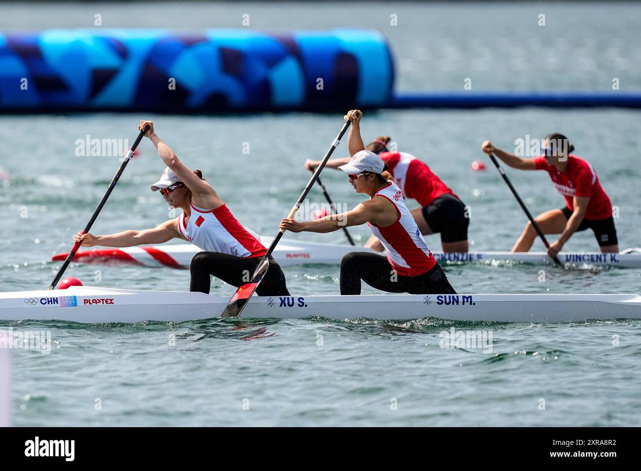 Shixiao Xu and Mengya Sun of China compete during Women's Canoe Double ...