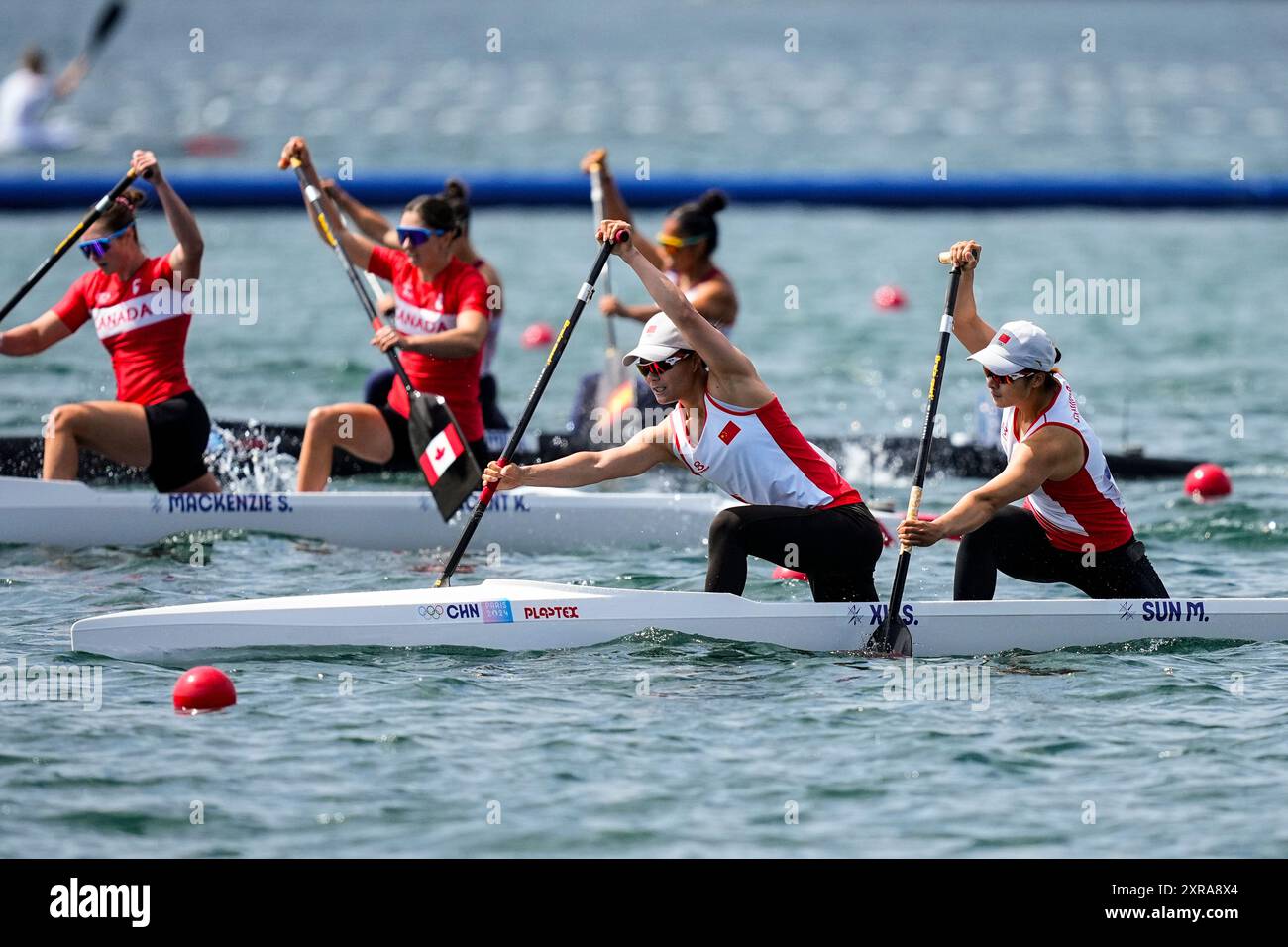 Shixiao Xu and Mengya Sun of China compete during Women's Canoe Double ...
