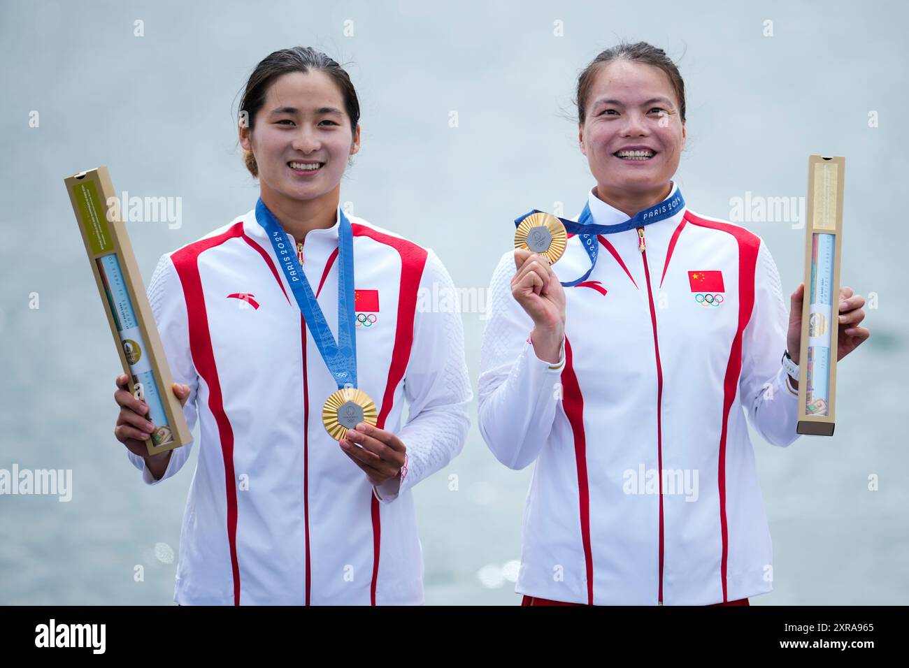 China's Sun Mengya and Xu Shixiao pose with gold medals during a ...