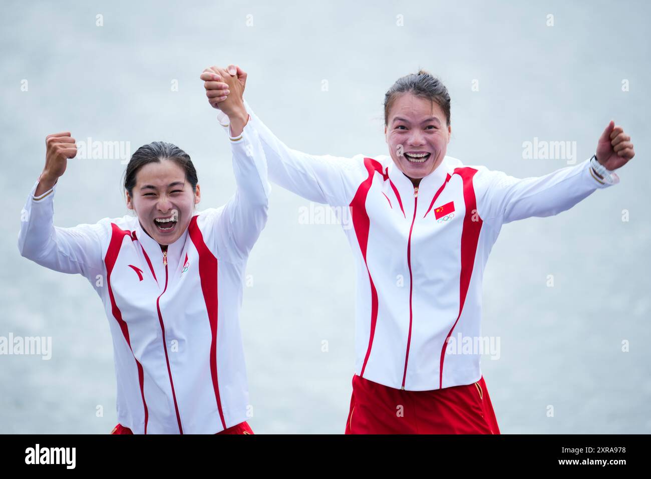 Gold medalists China's Sun Mengya and Xu Shixiao pose during a medal ...
