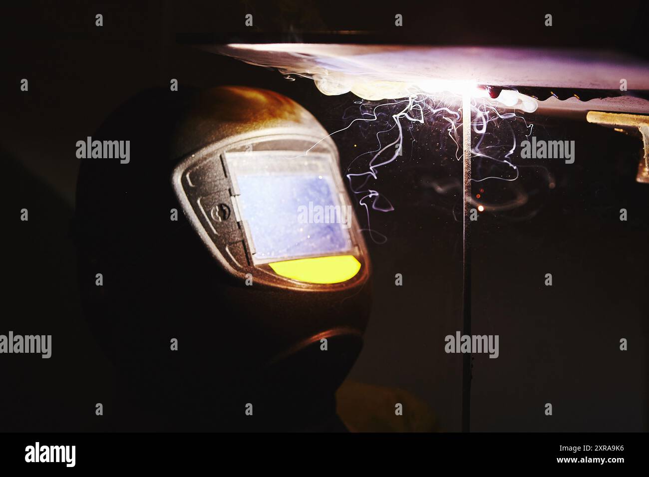 Man in protective mask welds hi-res stock photography and images - Alamy