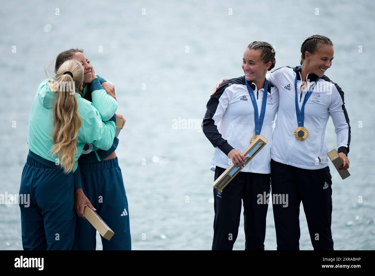 Silver medalists Hungary's Tamara Csipes and Alida Dora Gazso attend a ...