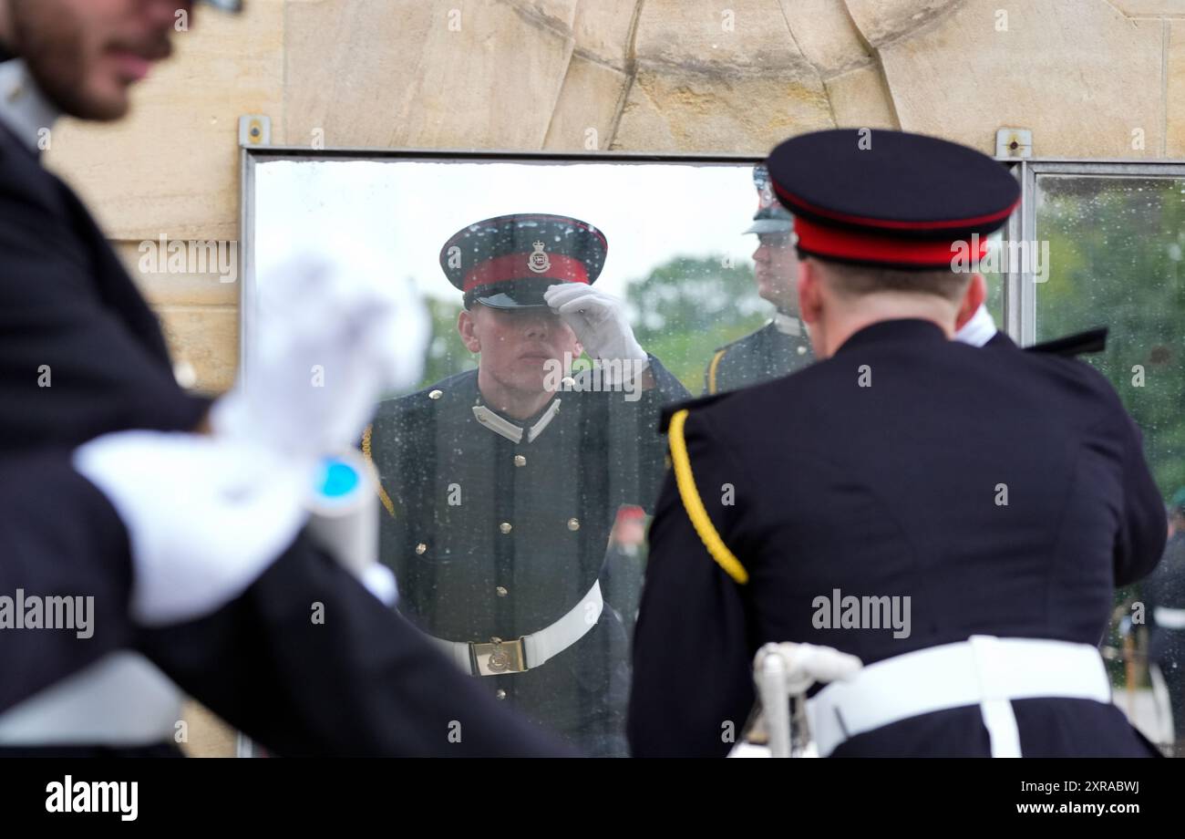 An Officer Cadet checks his uniform ahead of the Sovereign's Parade at ...