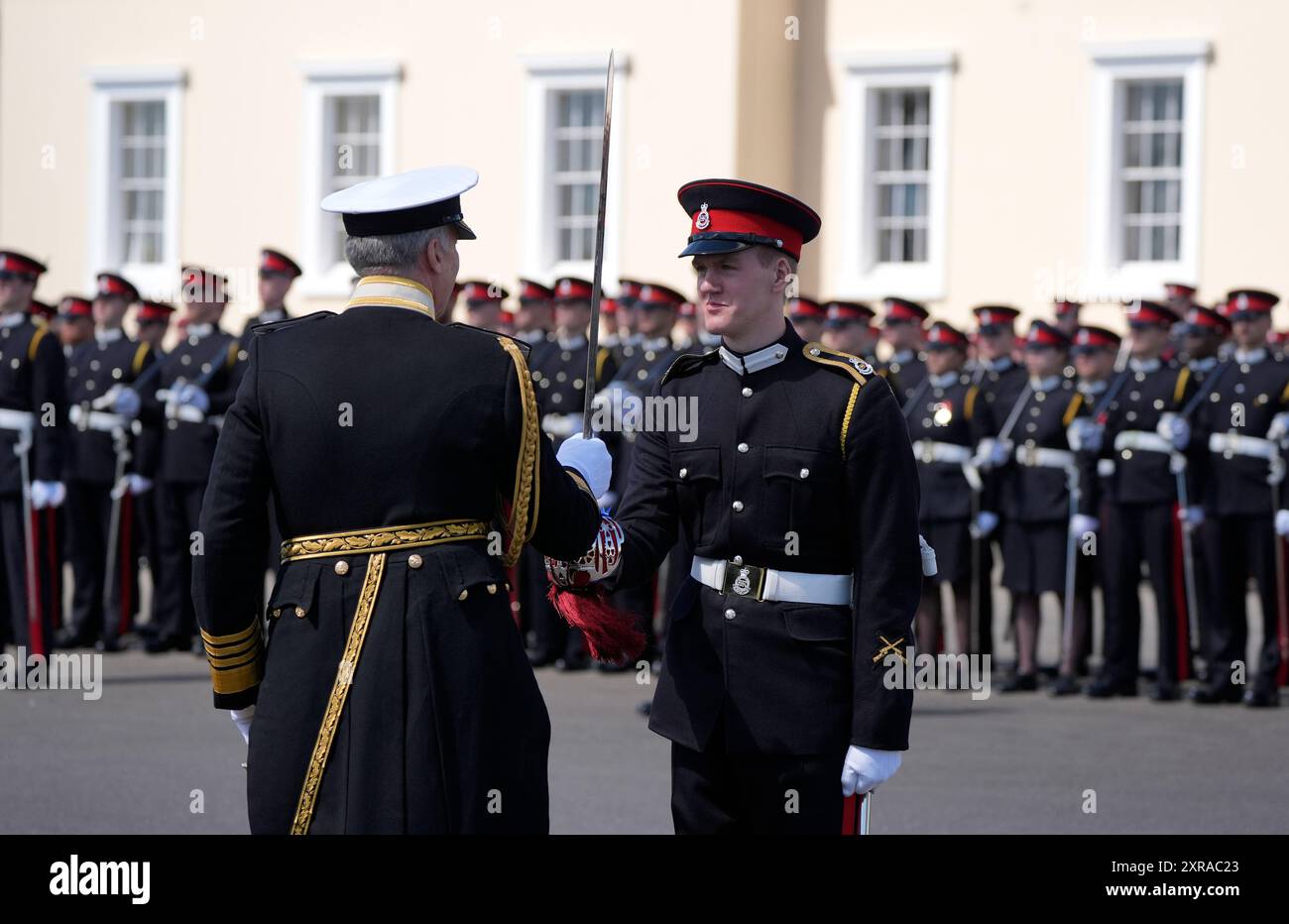 Chief of the Defence Staff Admiral Sir Tony Radakin (left) presents ...
