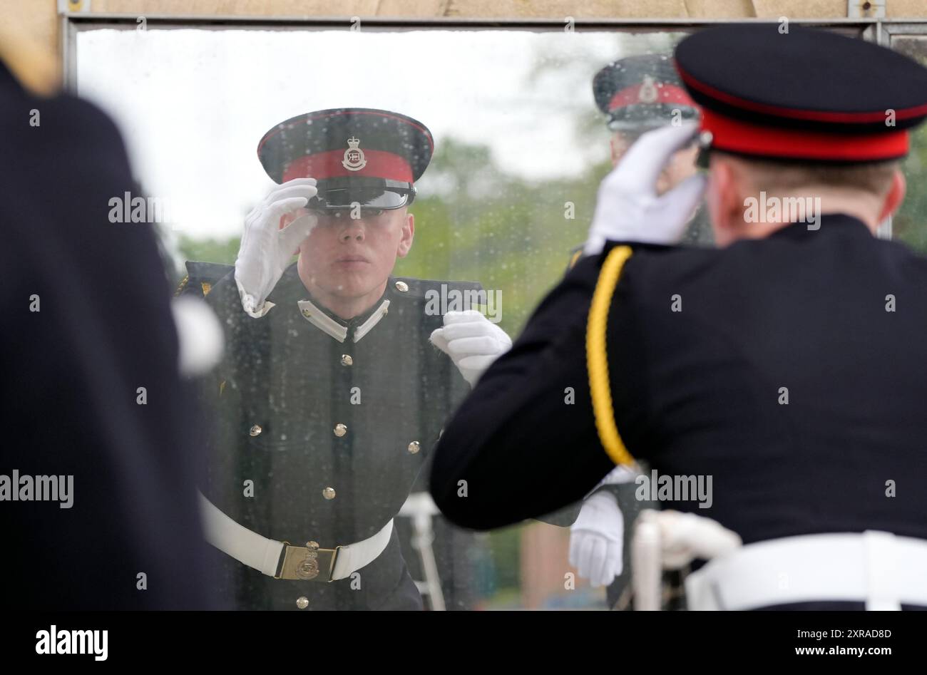 An Officer Cadet checks his uniform ahead of the Sovereign's Parade at ...