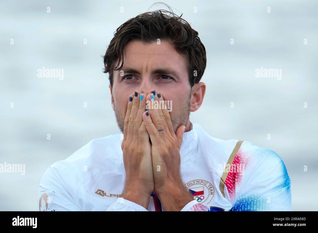 Martin Fuksa, of Czech Republic, celebrates gold during a medals ...