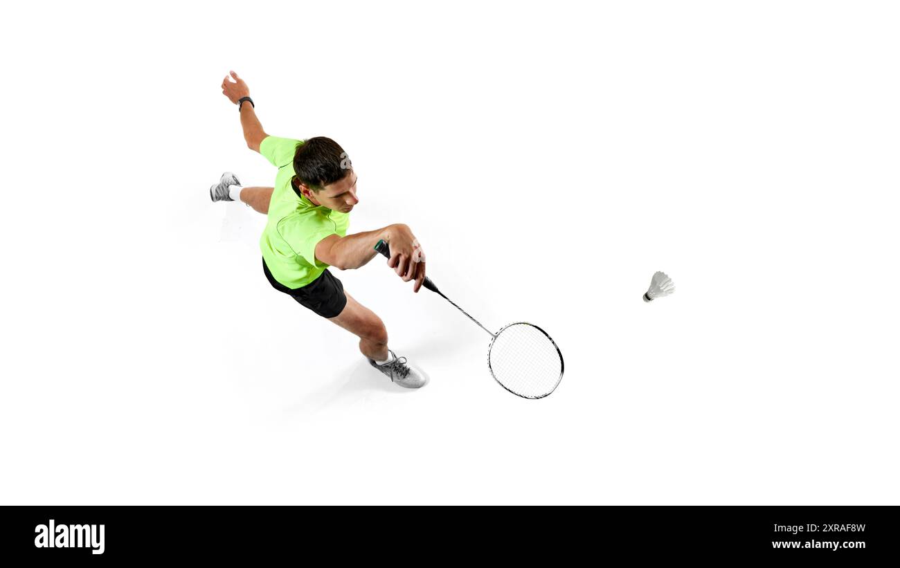 Young man, badminton player in motion, training hard, demonstrating ...