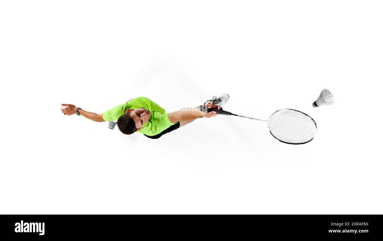 Aerial view on young man, badminton player in green t-shirt and black ...