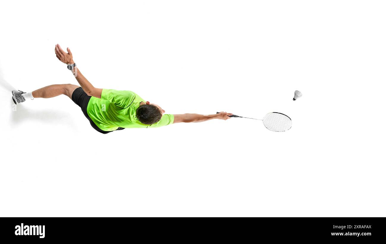 Endurance and motivation. Top view image of young man, badminton player ...