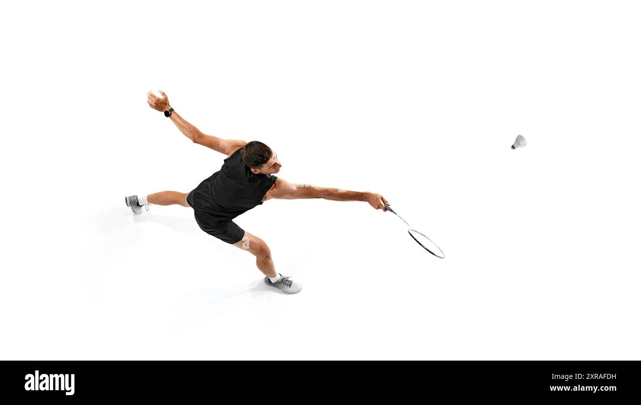 Focused and motivated man, badminton player training, playing with ...