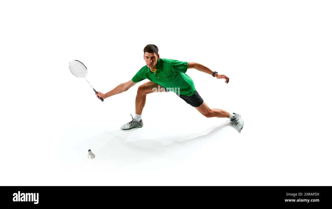 Determination and endurance on court. Focused male badminton player ...