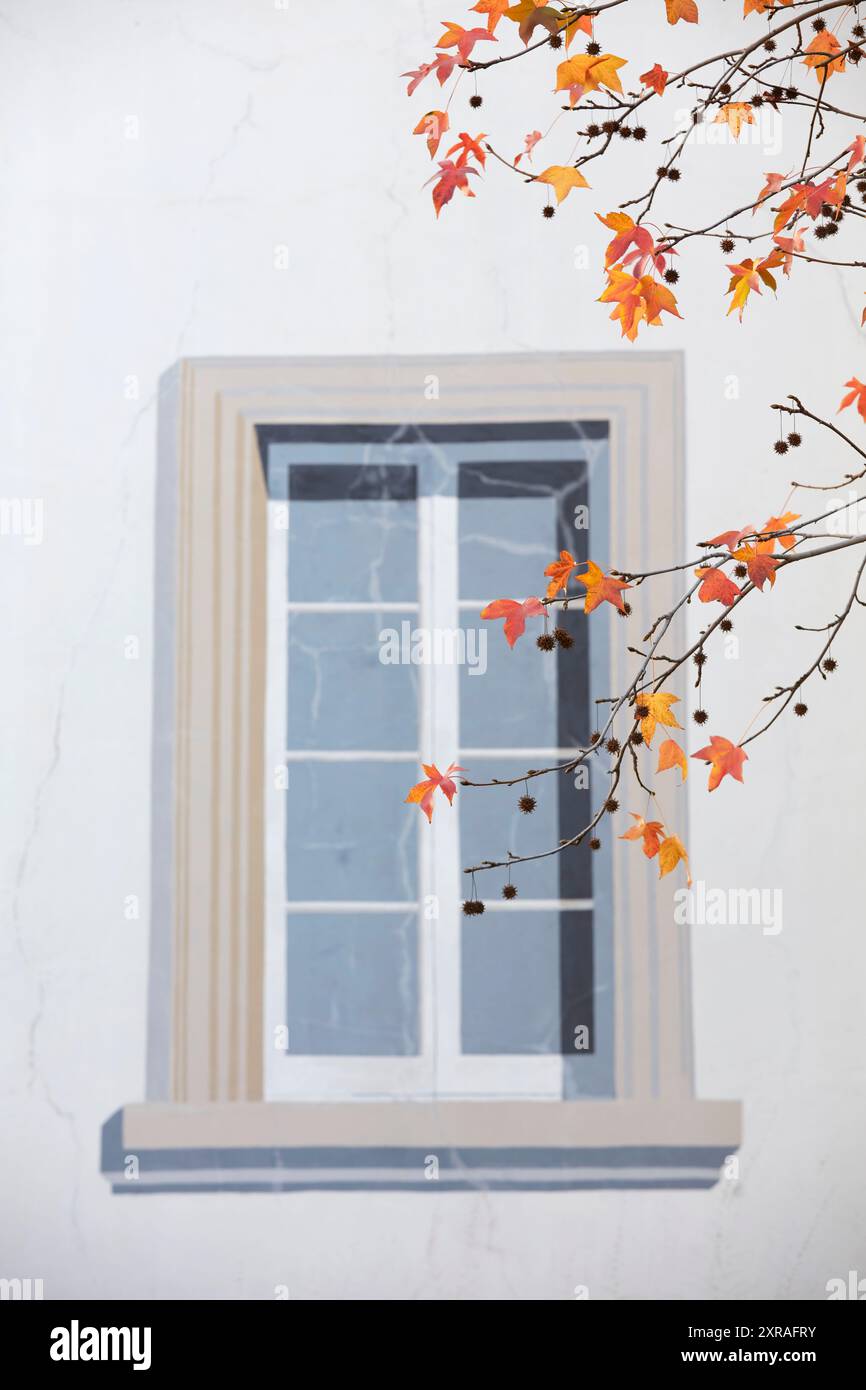 Mural art windows painted over a facade of the Atucha Palace, with a ...