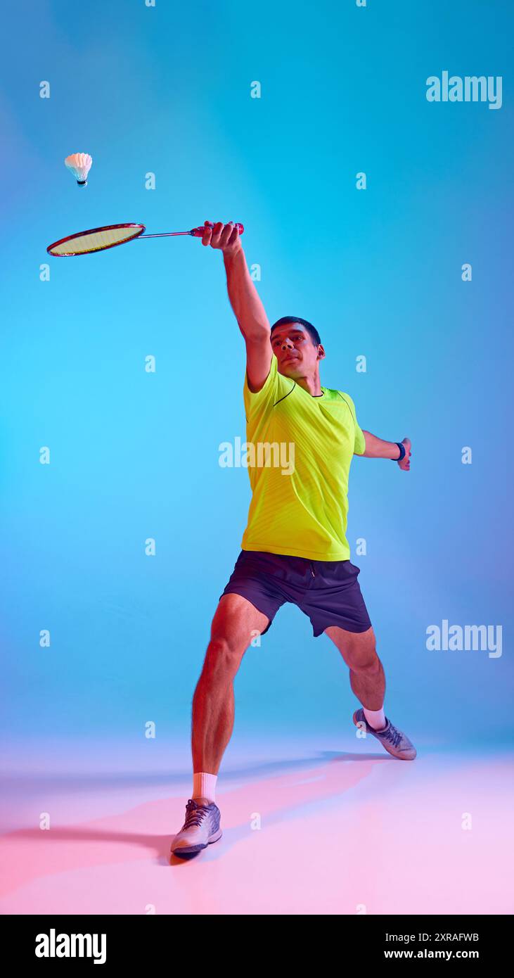 Showing concentration. Full-length of focused man, badminton player ...