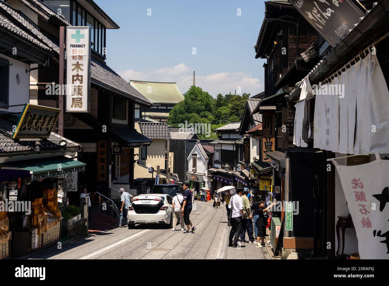 Narita, Japan - July 23 2024: Omotesando street lined with traditional ...